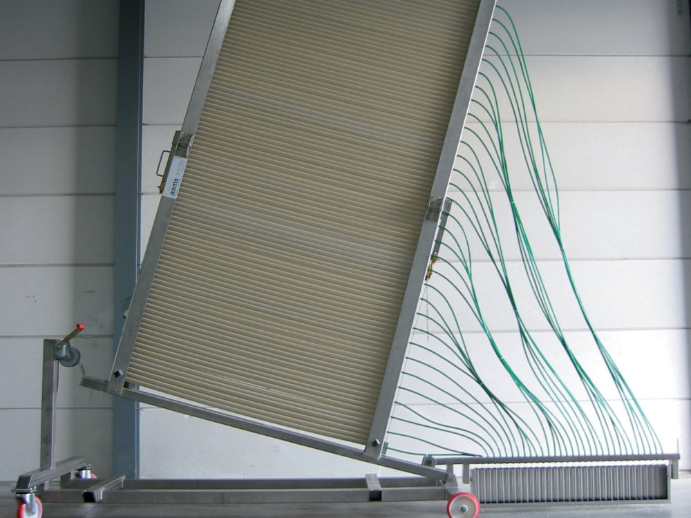 Vertical patternator with lamellae